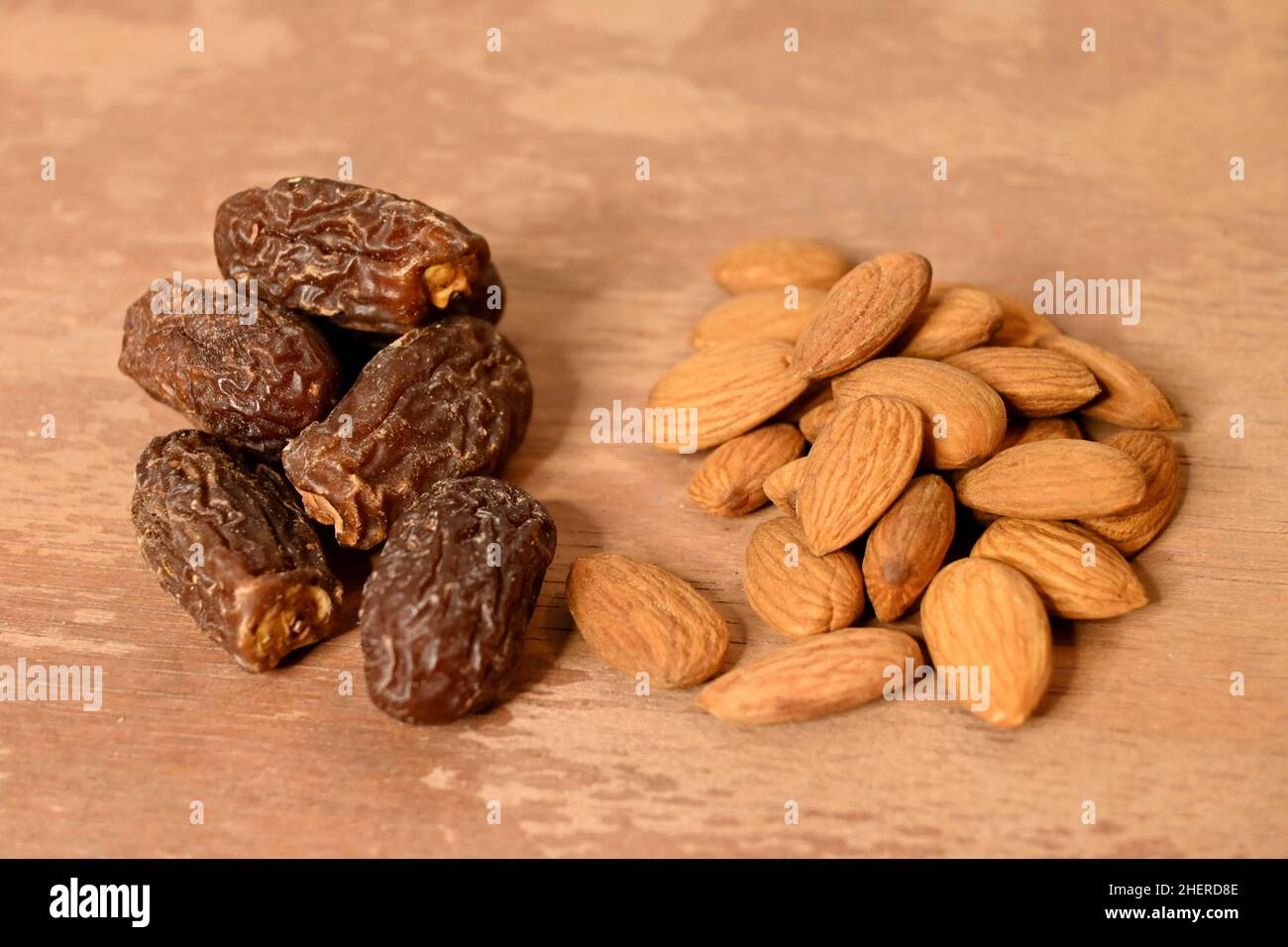 closeup the bunch brown almond nuts with brown synonyms over out of ...