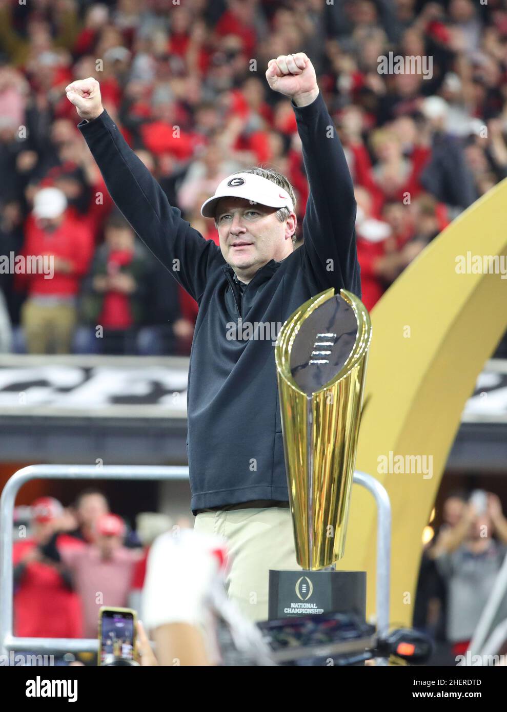 Georgia Bulldogs head coach Kirby Smart celebrates during the trophy ...