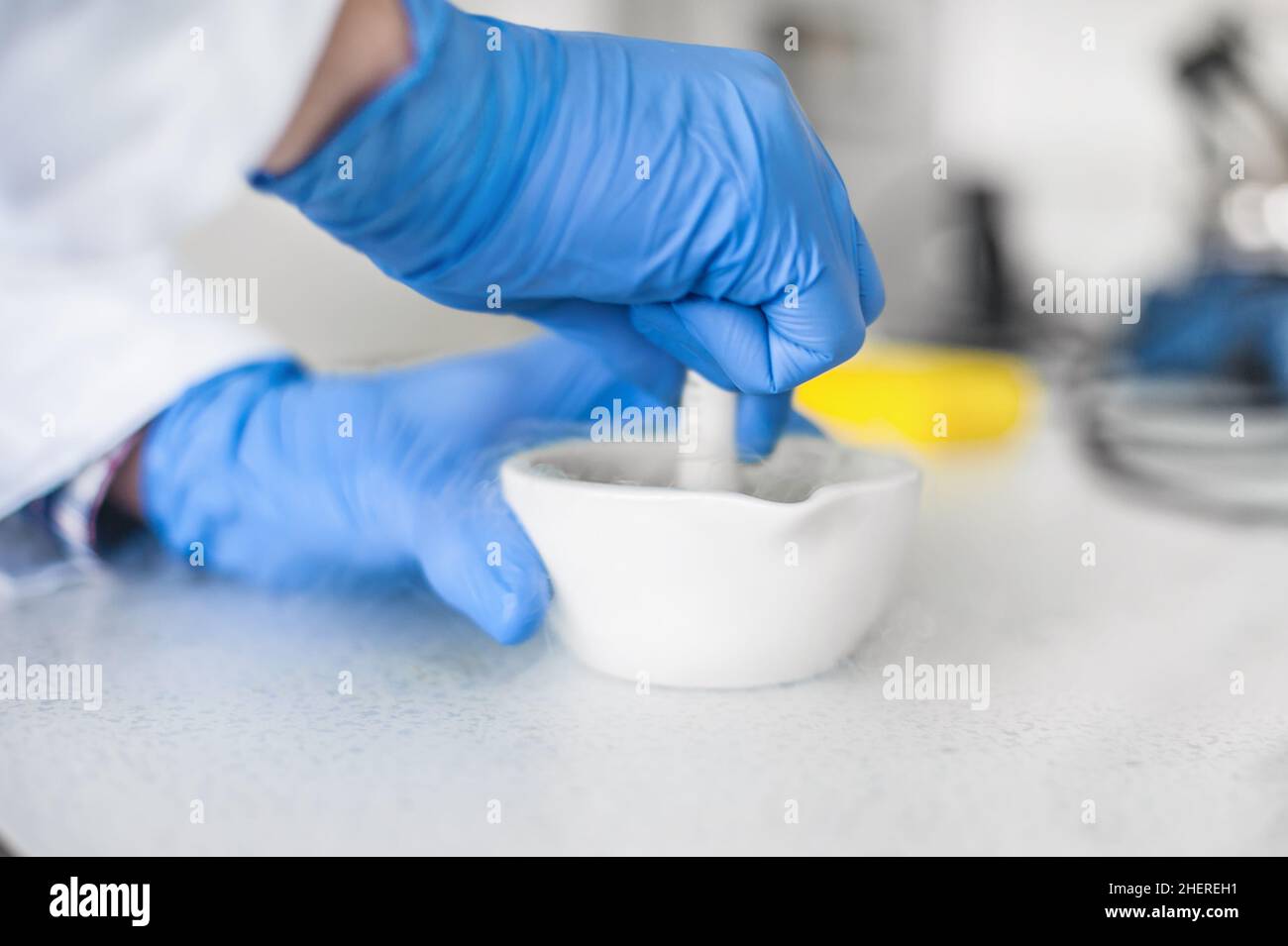 Chemist performs an experiment with liquid nitrogen in laboratory ...