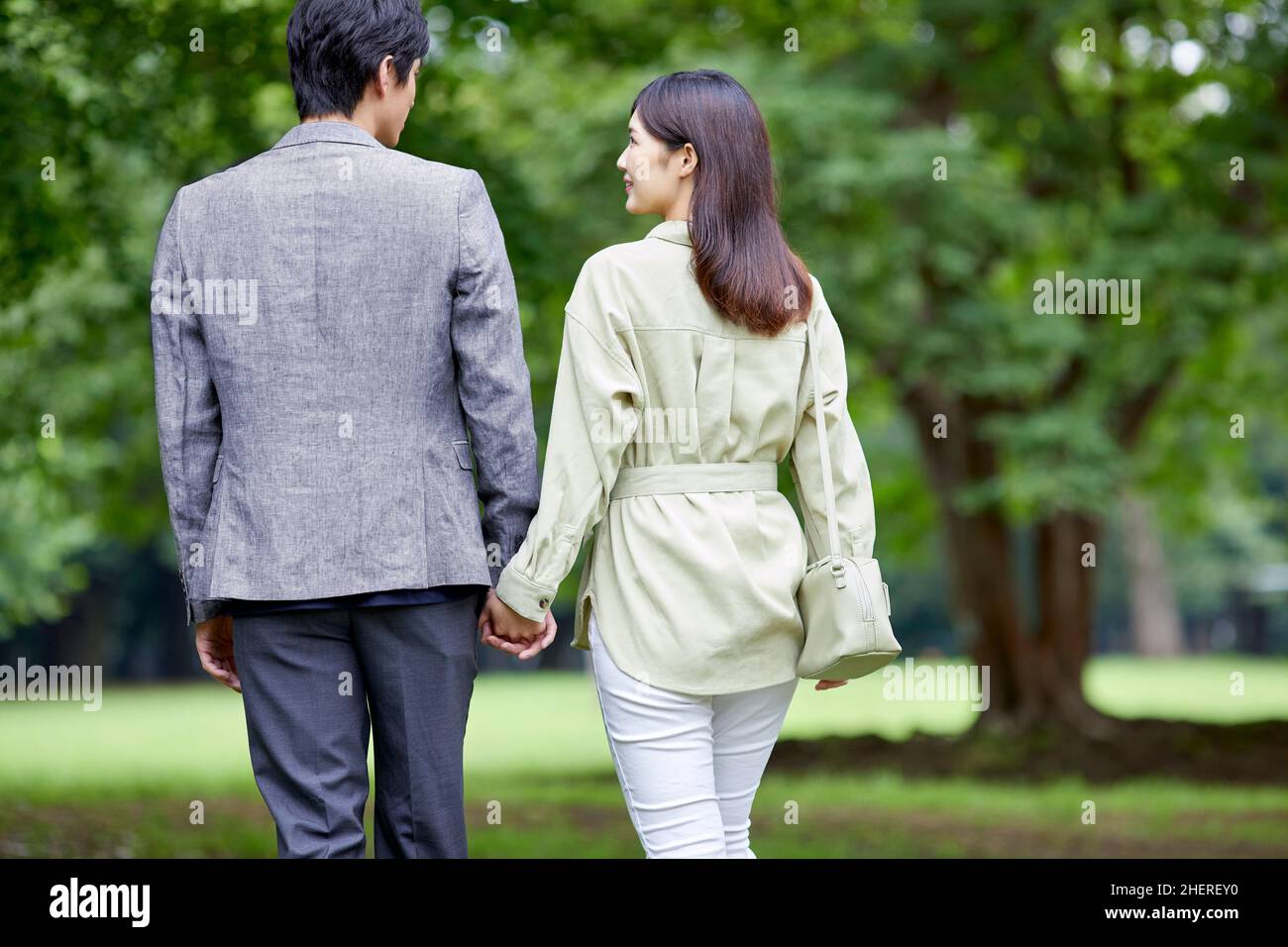 Japanese Couple Taking A Walk In The Park Stock Photo - Alamy