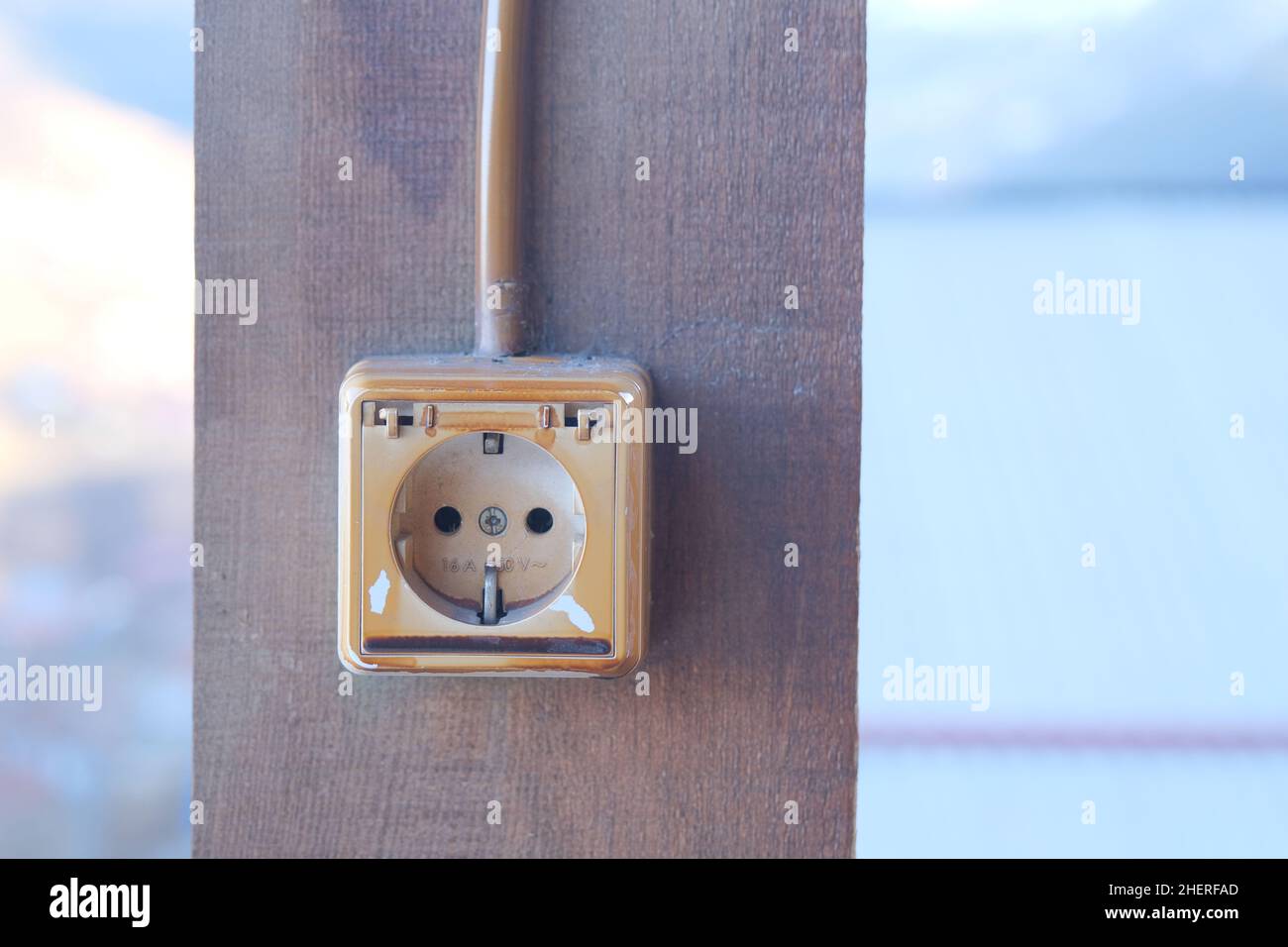 Ancient style electricity plug and electrical socket wooden isolated ...