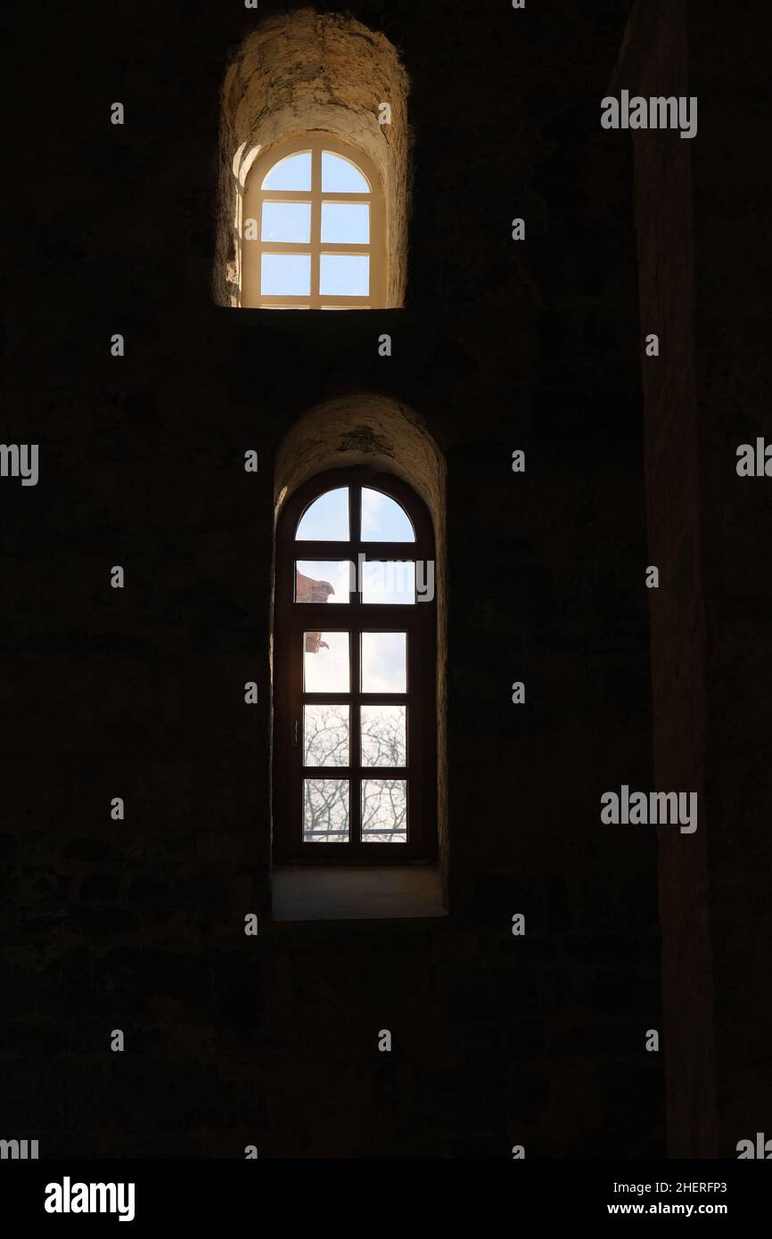 Ancient windows, vertical photo of two windows showing outside of ...