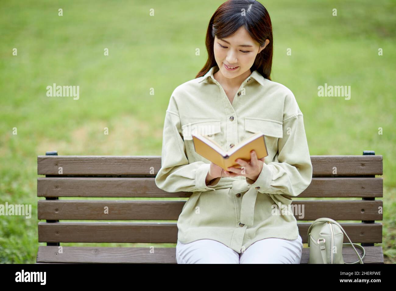 Japanese Woman Reading Stock Photo - Alamy