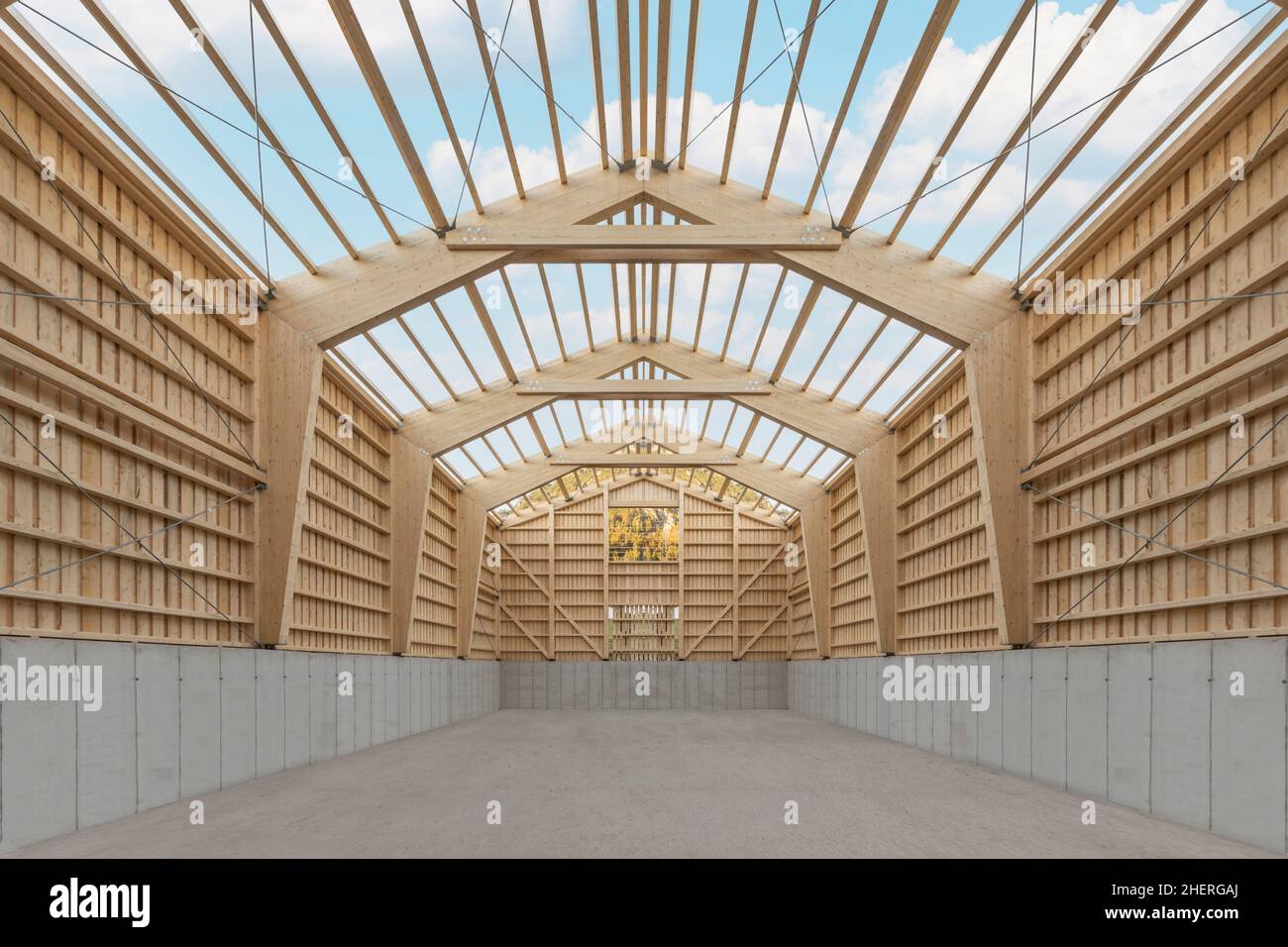 Interior of a large agricultural wooden hall during construction with ...