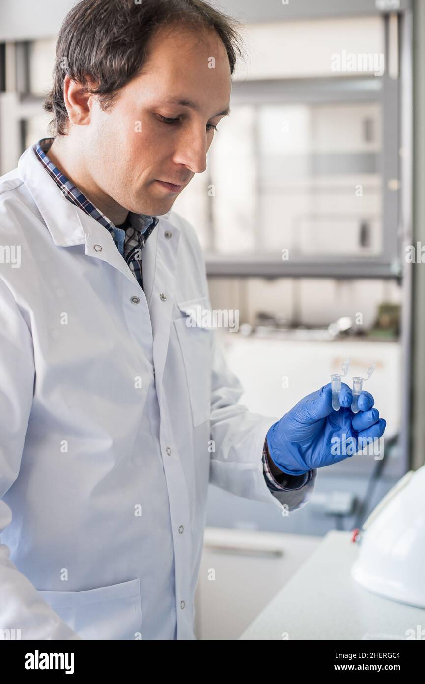 Male lab researcher holding hi-res stock photography and images - Alamy