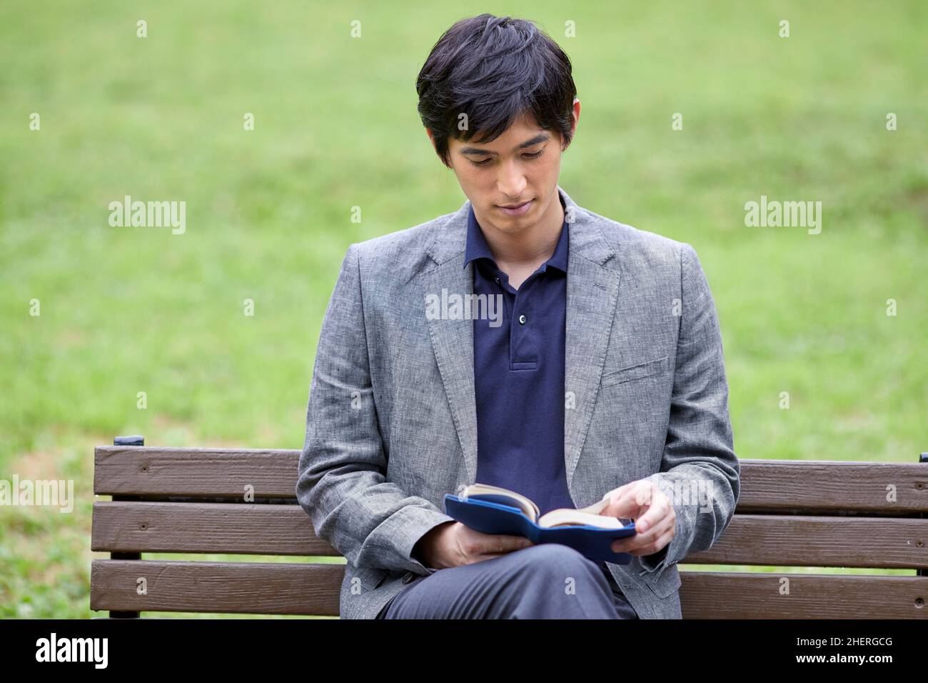 Japanese Man Reading Stock Photo - Alamy