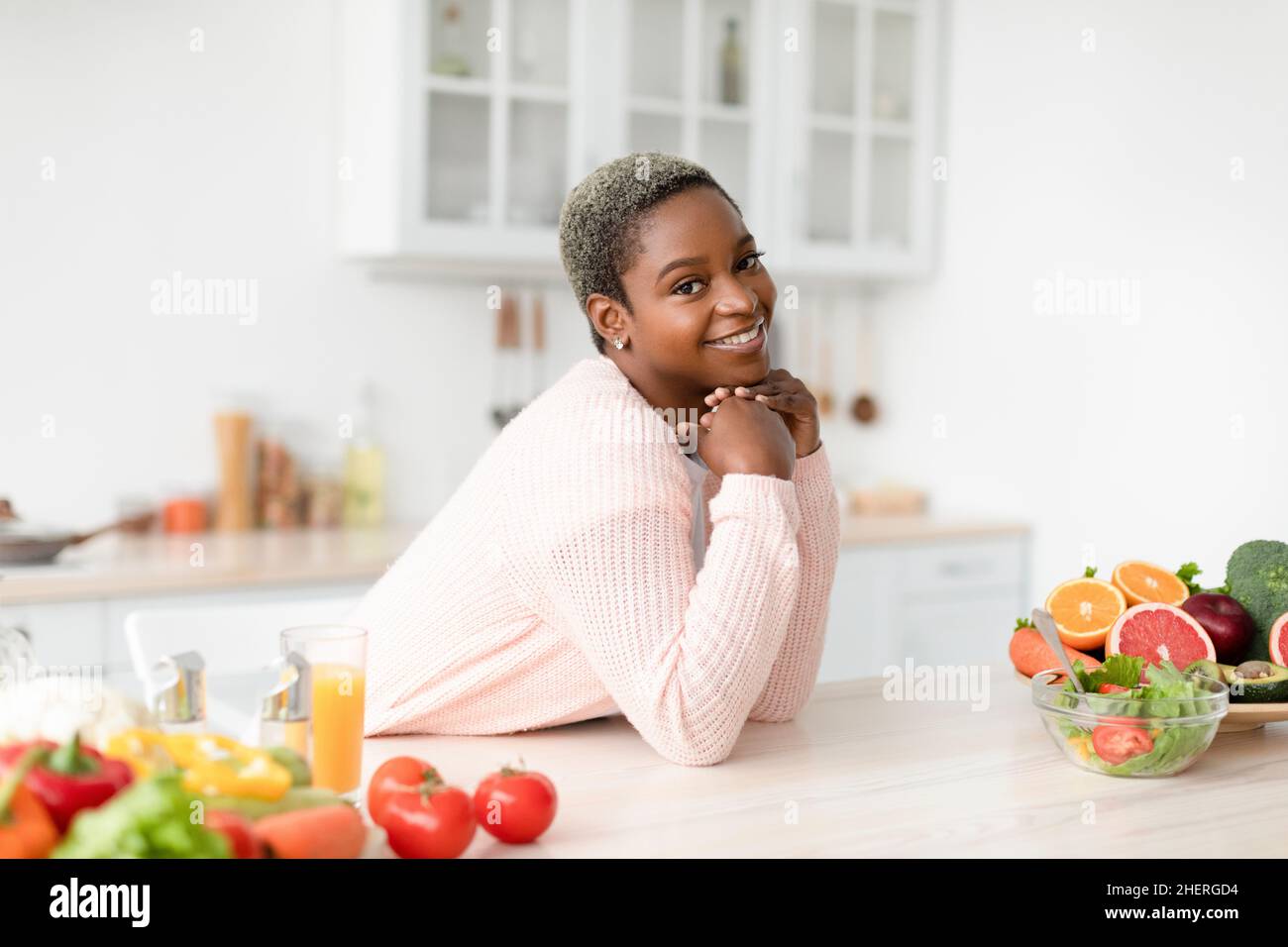 Happy young african american female blogger look at camera in ...