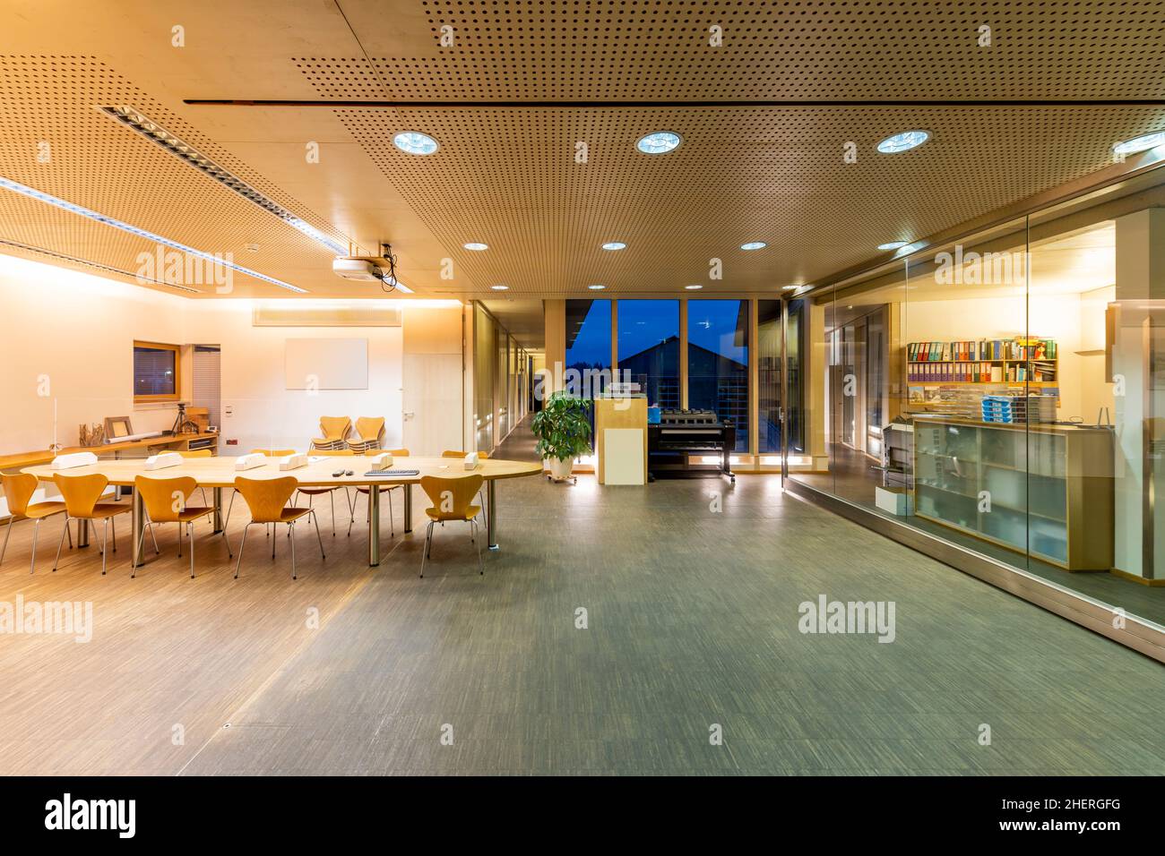 large meeting room in wood office building with acoustic ceiling and ...