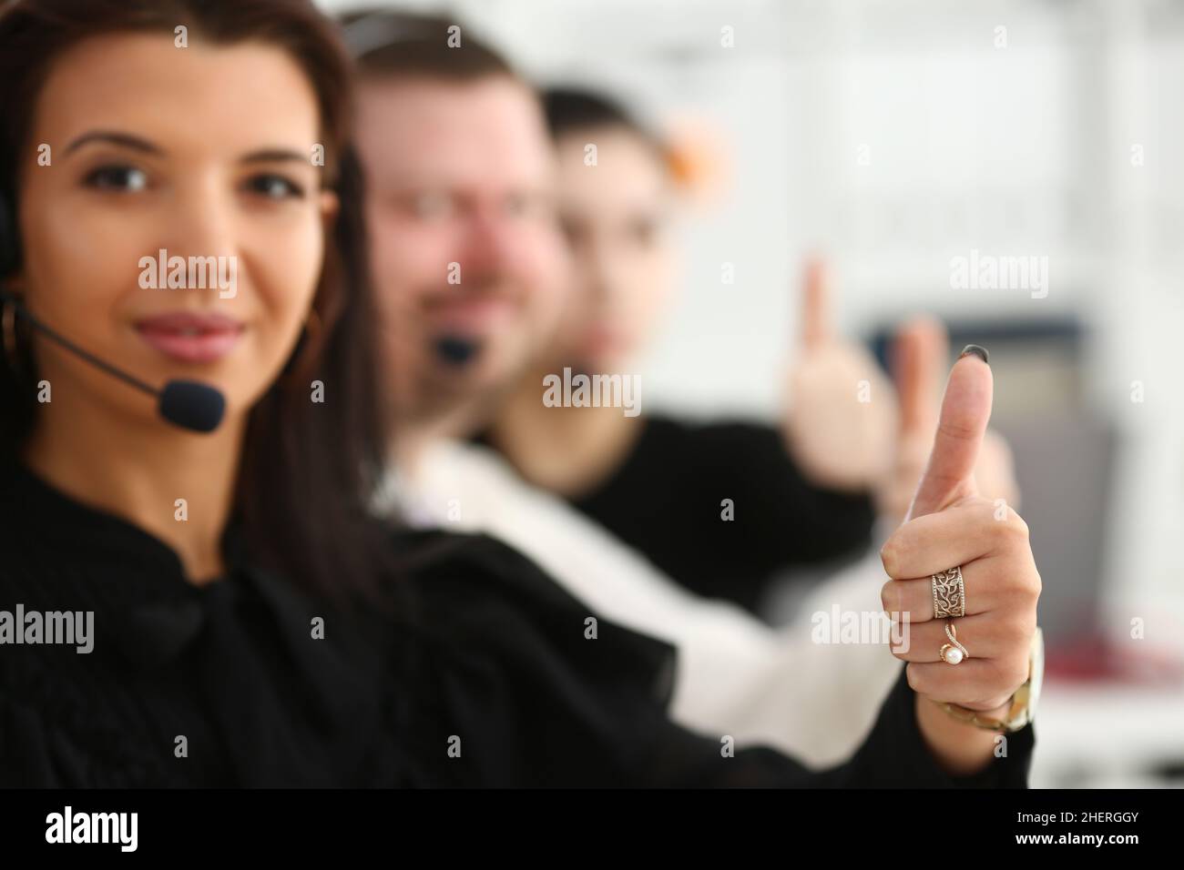 Call center operator team show OK gesture Stock Photo - Alamy