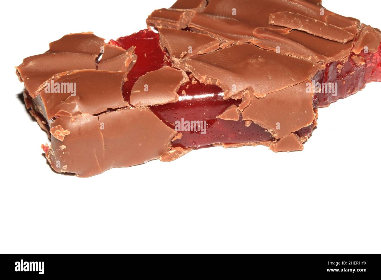 A Bitten Half Eaten Chocolate Bar with Cherry Jelly Inside on White ...