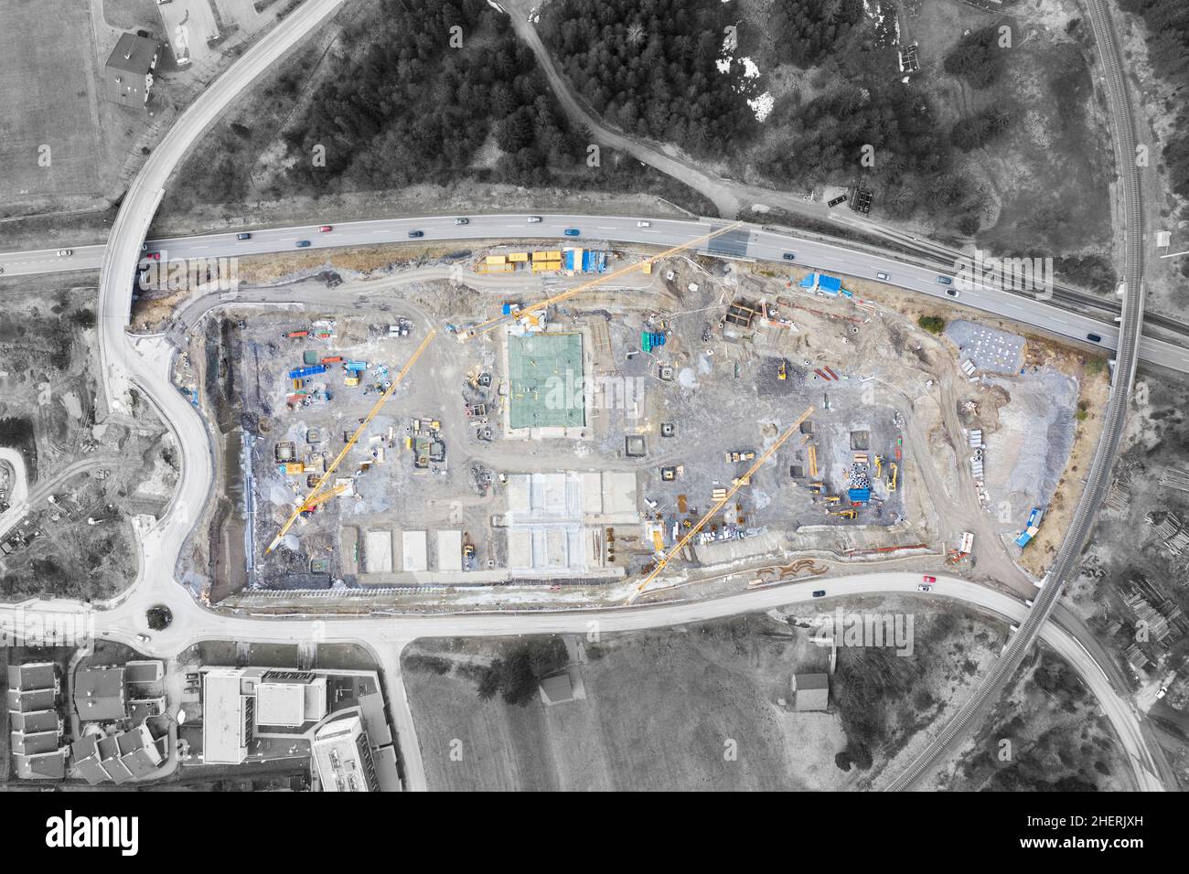 birds eye aerial top view to large construction building site with ...