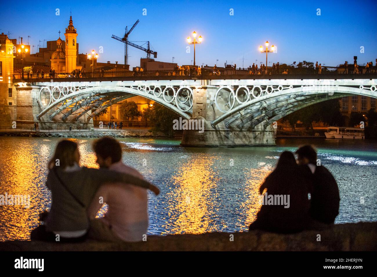 Isabel II bridge or Triana bridge. Guadalquivir river. Seville ...