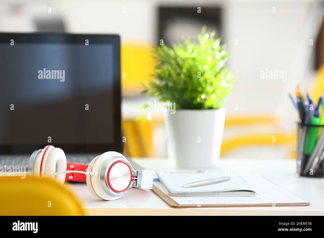 Empty remote office workplace with laptop pc and headset Stock Photo ...
