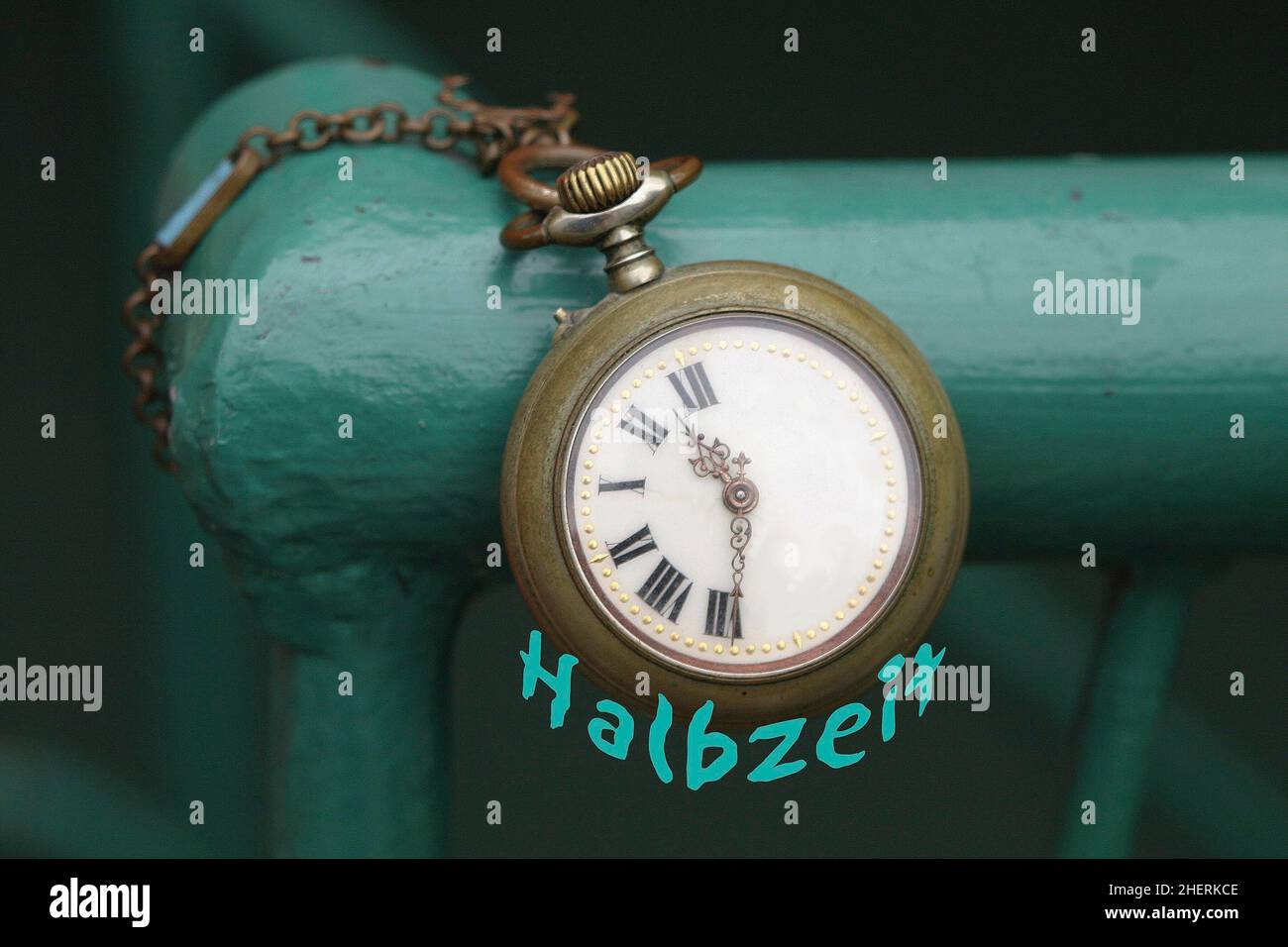 Pocket Watch with Half Dial and Writing Half Time Stock Photo - Alamy
