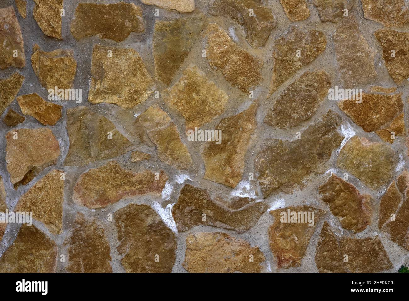 Damp natural stone wall with efflorescent saltpetre Salt Stock Photo ...