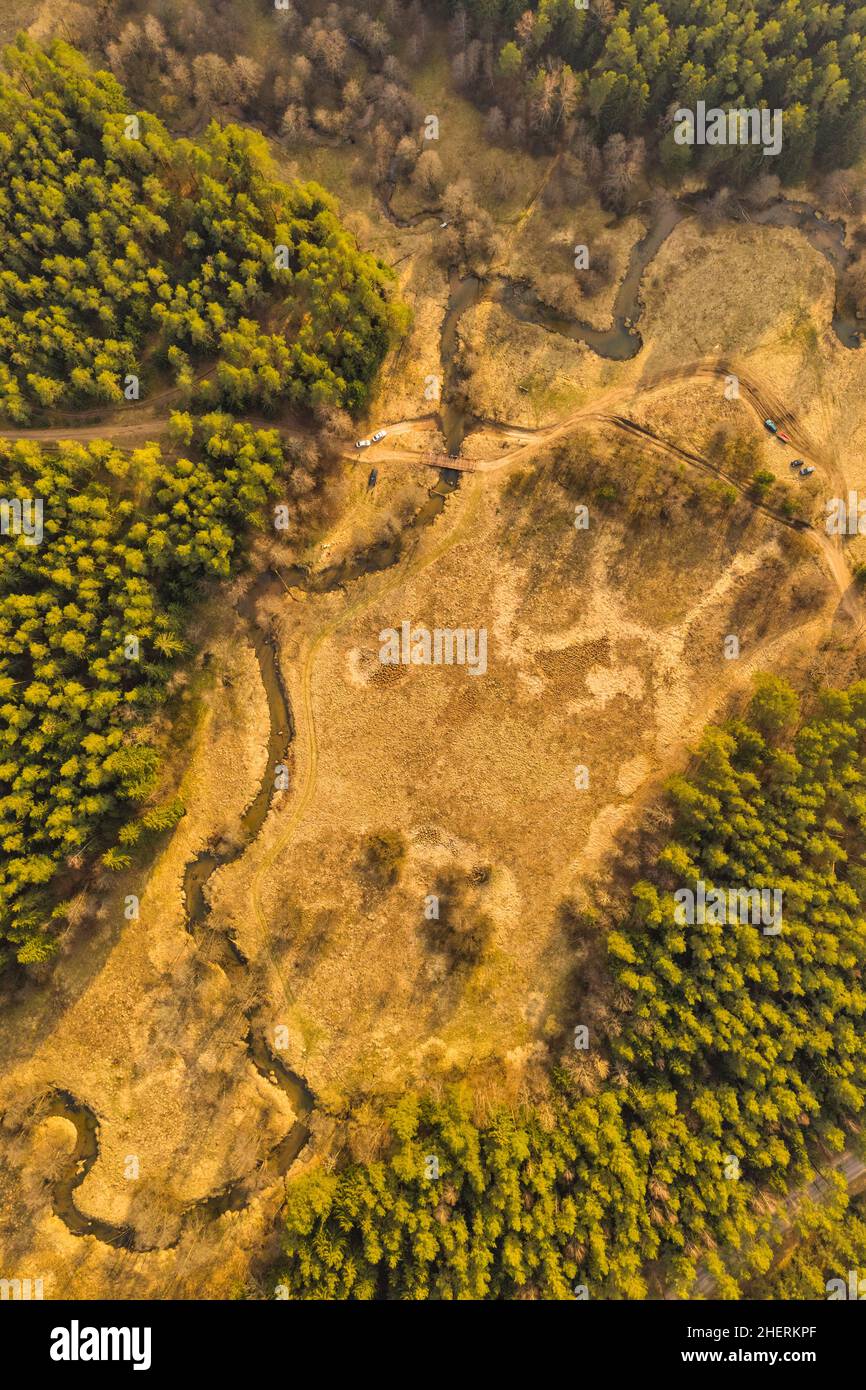 Aerial photograph of winding river in rural landscape. Small river ...