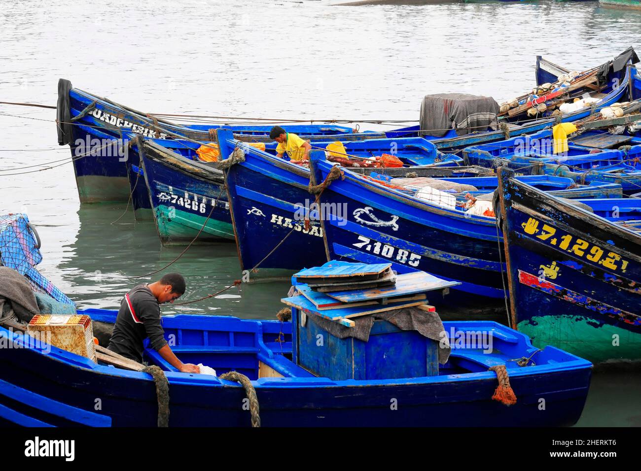 Typical blue fishing boats in the harbour of Essaouira, Morocco Stock ...
