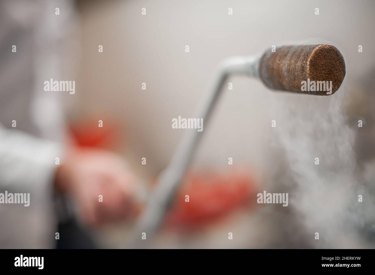 Smoking frozen pipe for liquid nitrogen. Close-up Stock Photo - Alamy