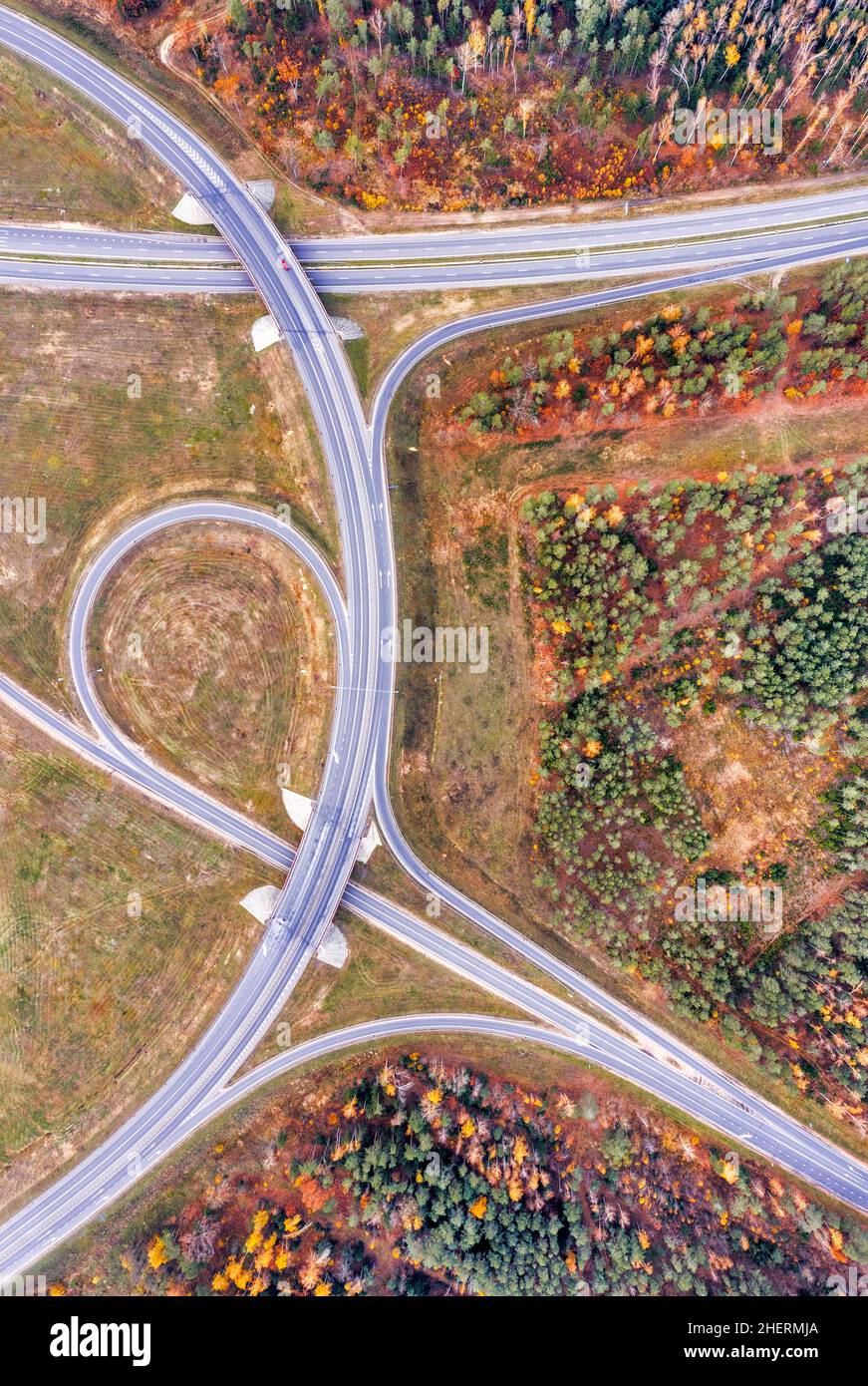 Aerial view on a circular road intersection near beautiful autumn ...