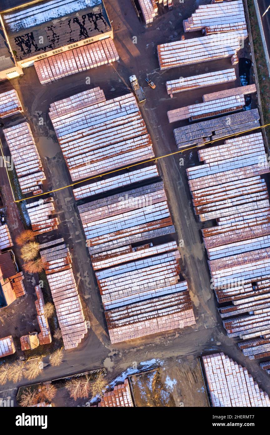 Brick production plant factory aerial. A lot of stacked bricks in a ...