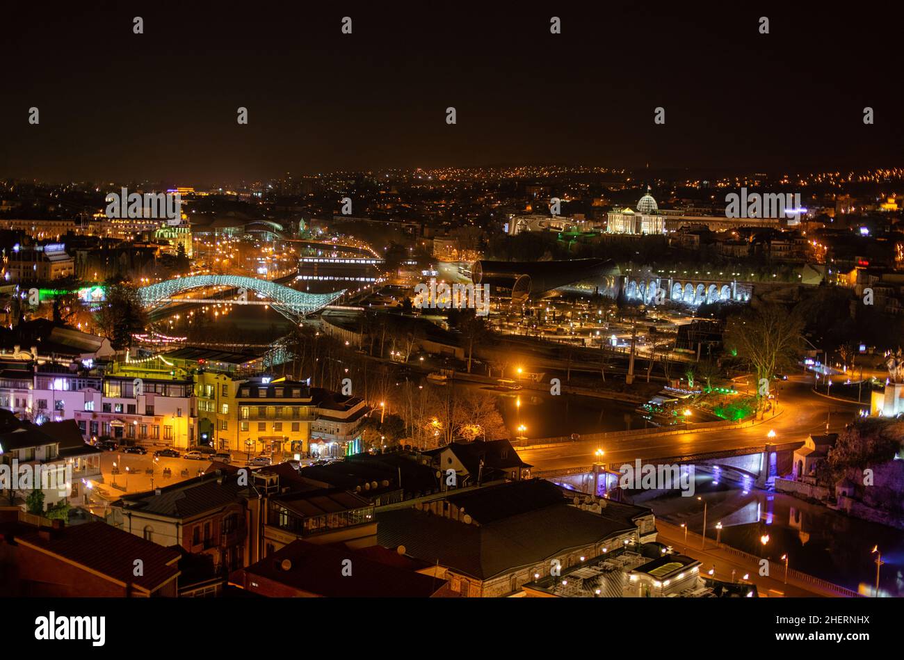 Aerial view of night cityscape of Tbilisi. Old town of Tbilisi the ...