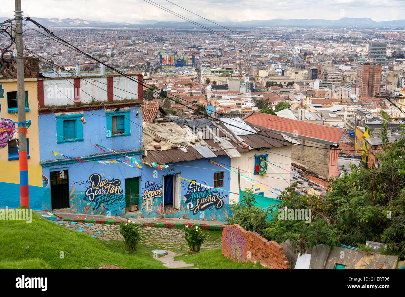 Street art murals on house walls in the once notorious gang Barrio ...