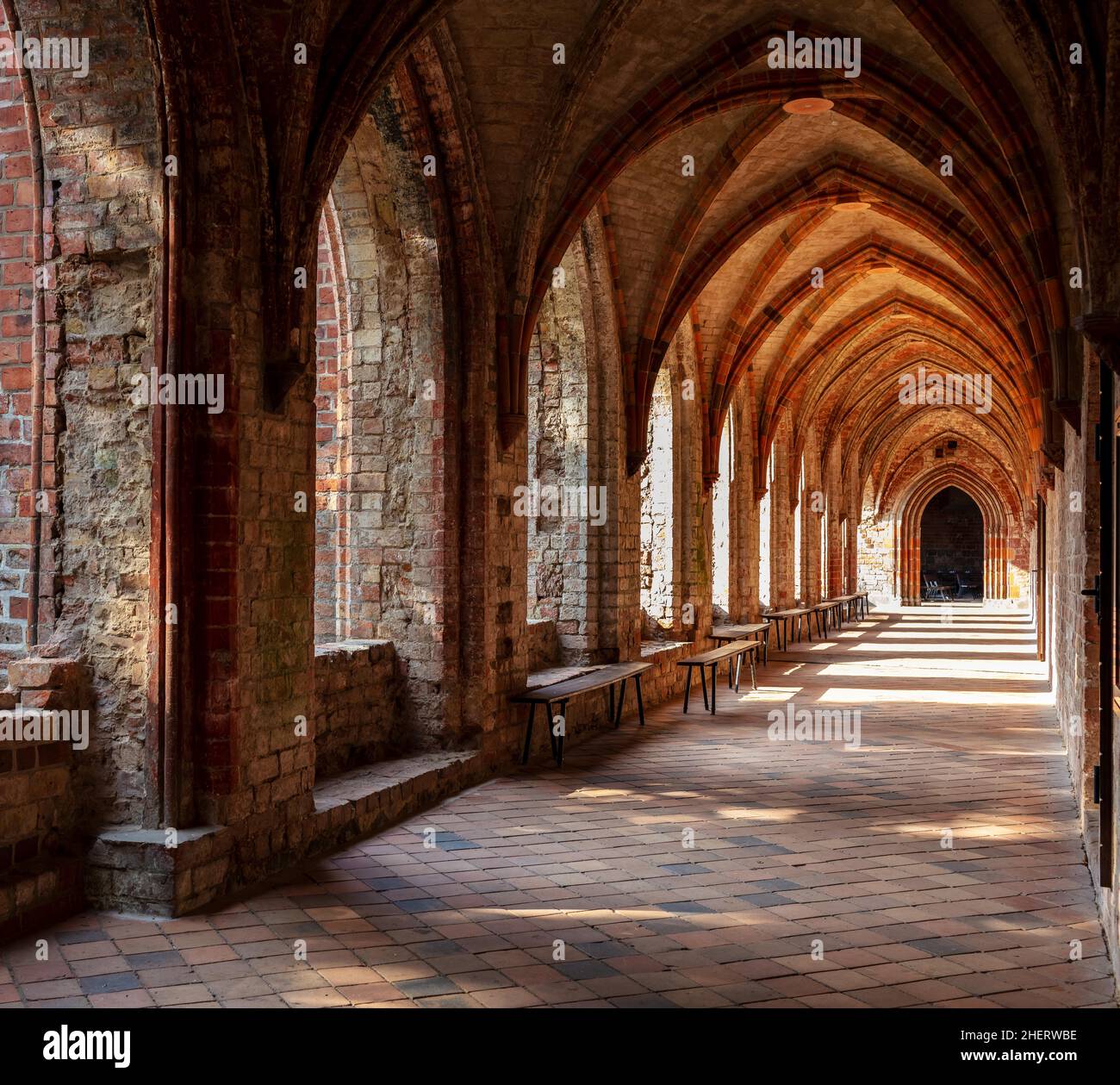 The Gothic monastery with its monastery church and the arcades inside ...