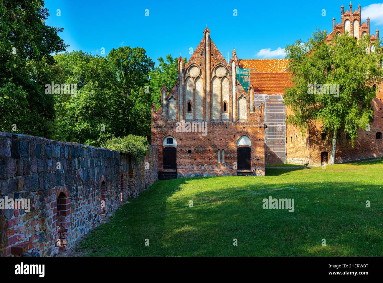 The Gothic monastery with its monastery church and the arcades inside ...