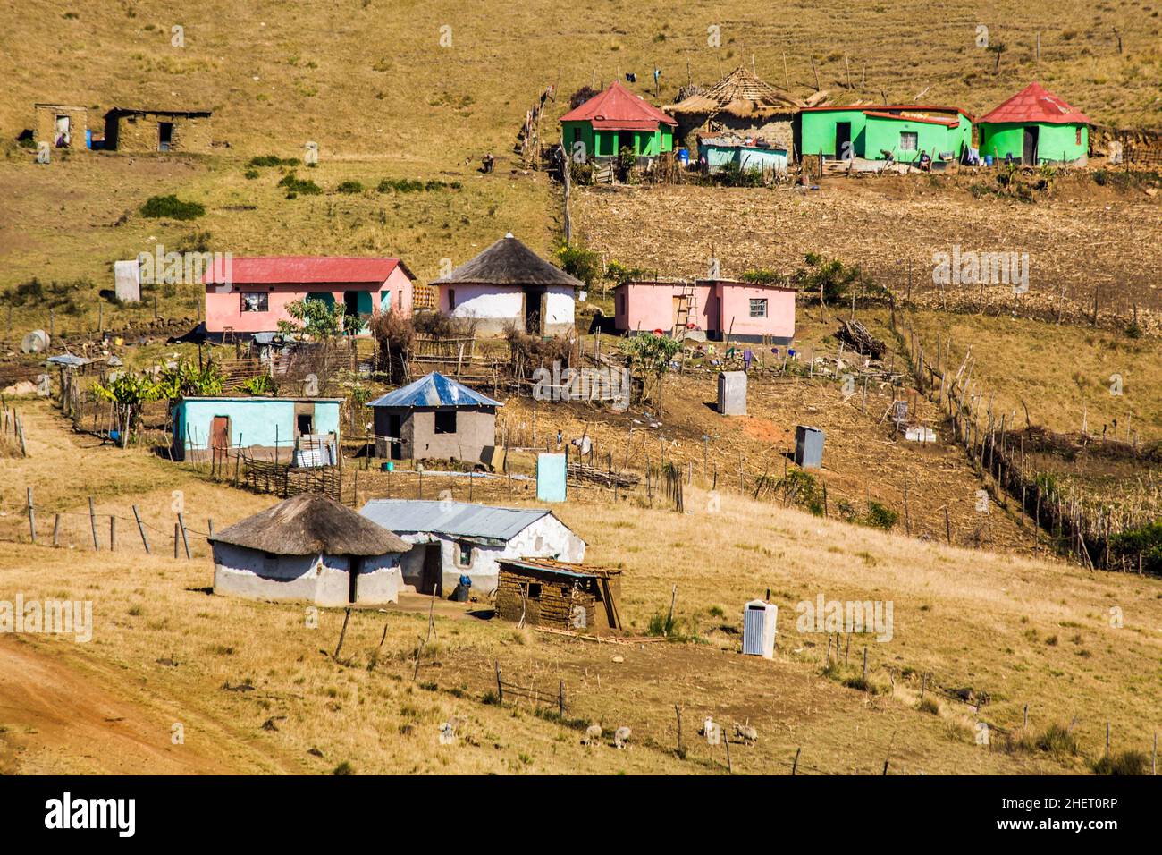 Hilly landscape characterised by the colourful huts, typical of the ...
