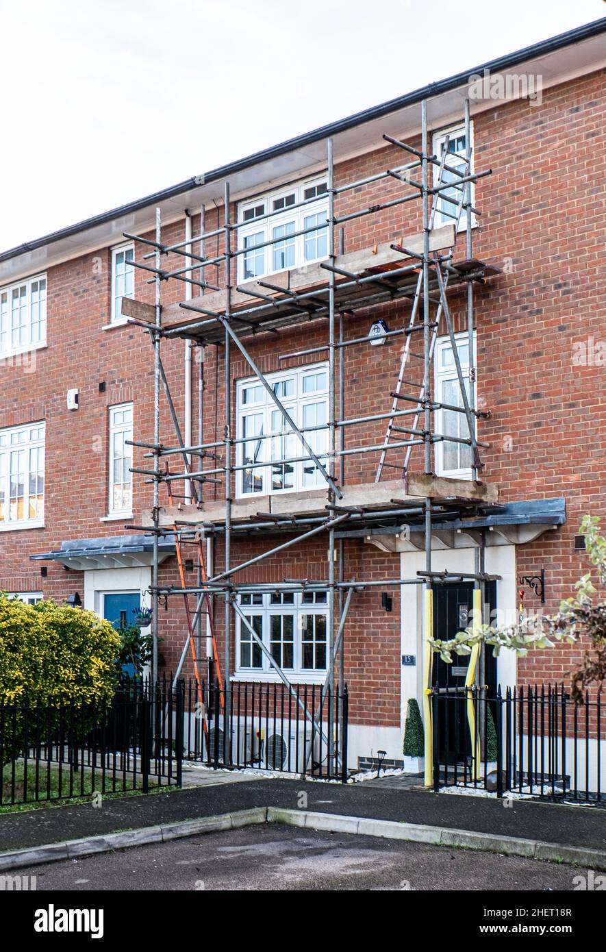 Scaffolding and building work to residential property Stock Photo - Alamy