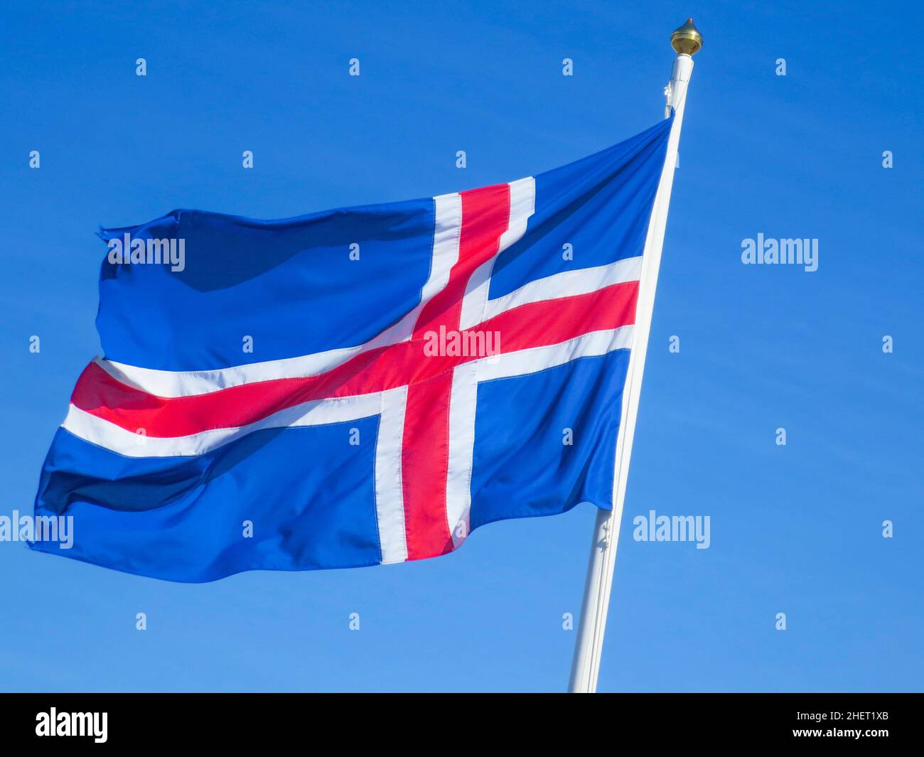 icelandic flag in wind under clear blue sky Stock Photo - Alamy