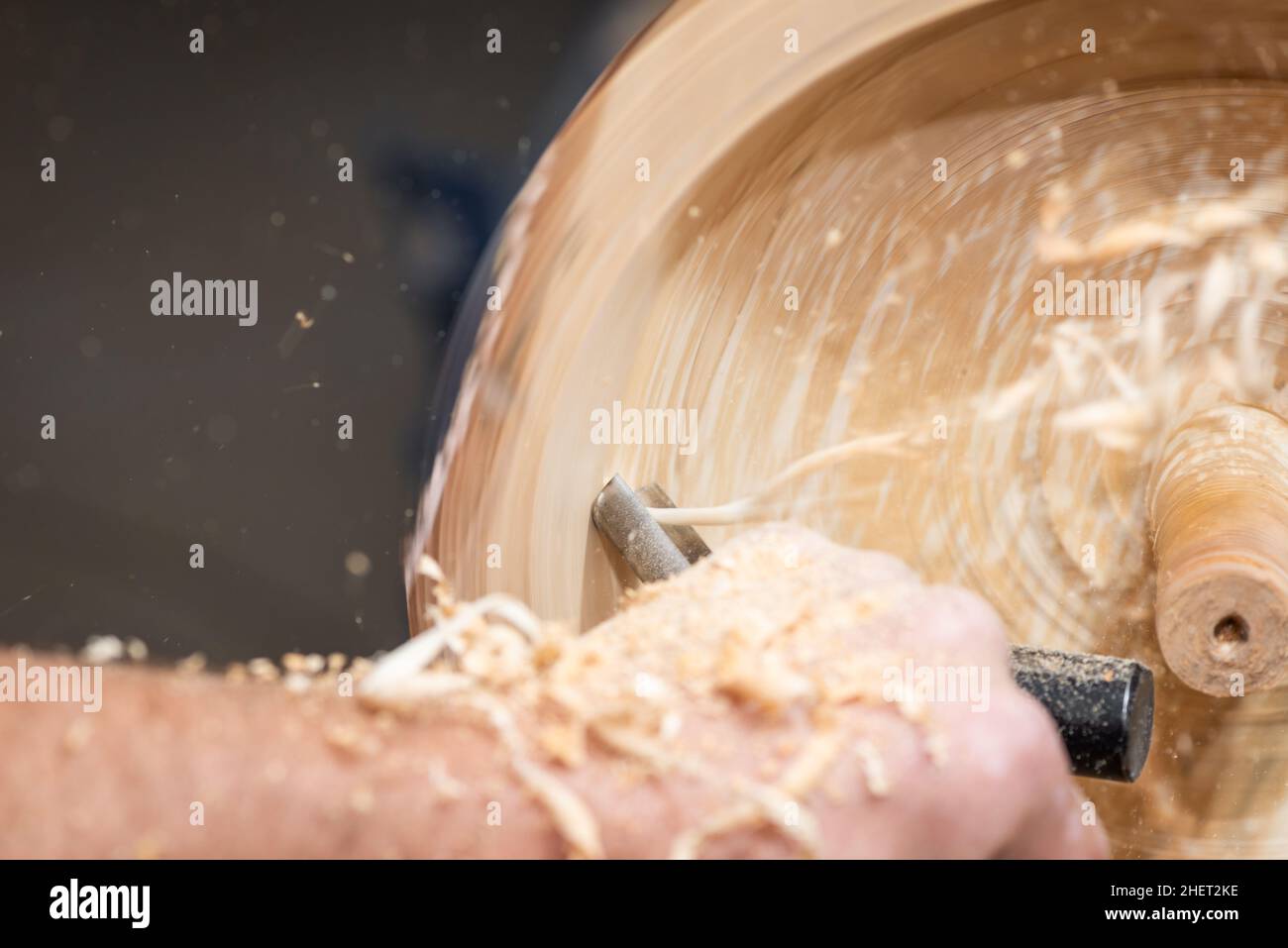 long spiral wood shavings while making a wooden bowl on turnery machine ...