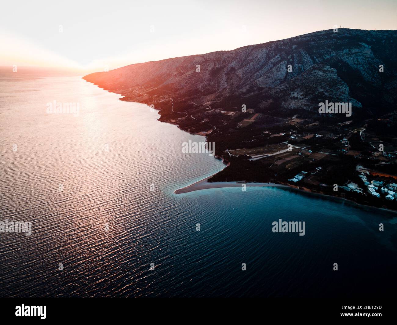 Zlatni rat beach in Bol at sunset, Island Brac, Croatia Stock Photo - Alamy