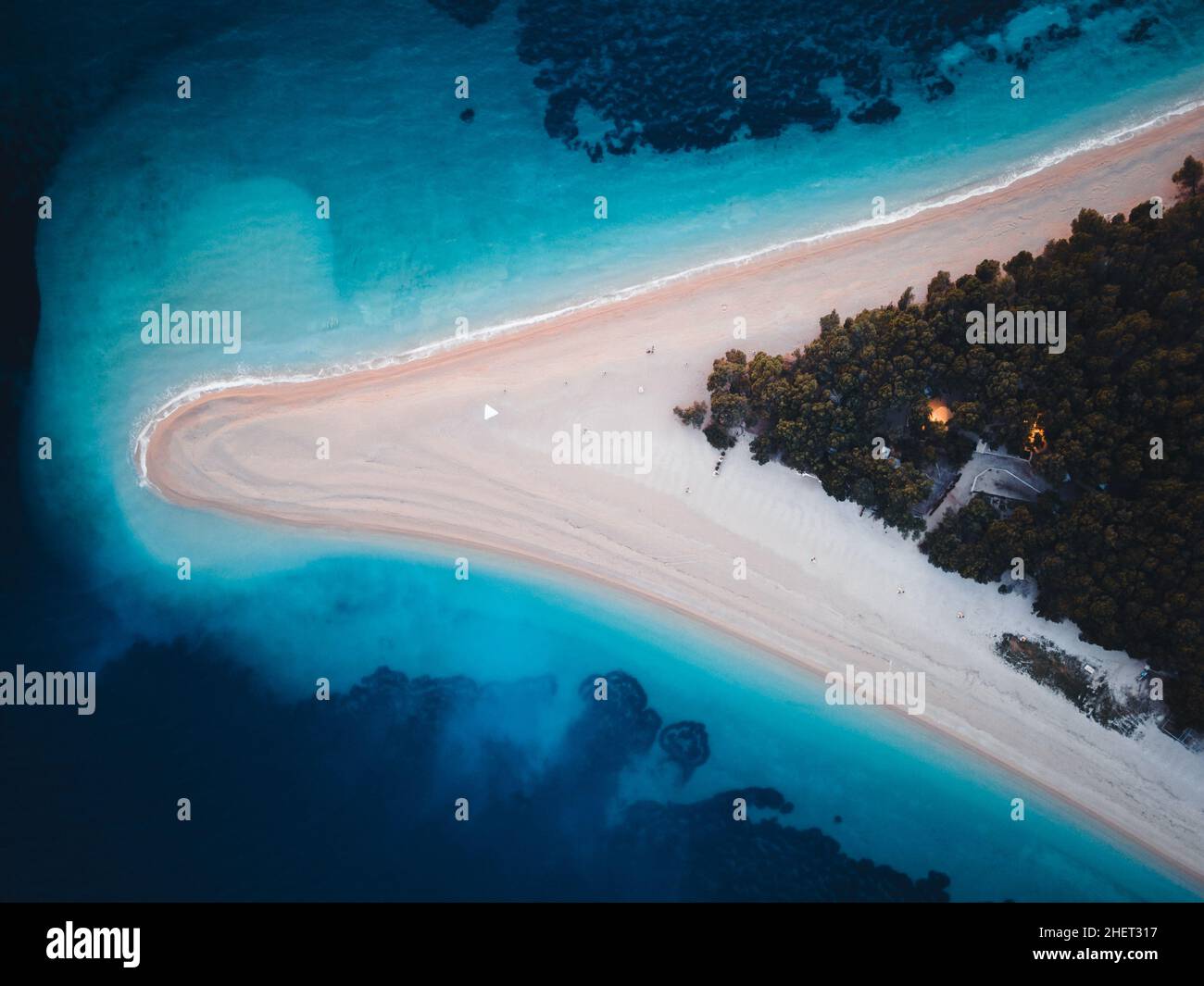 Top down view of famous Zlatni rat beach in Bol at night, first lights ...