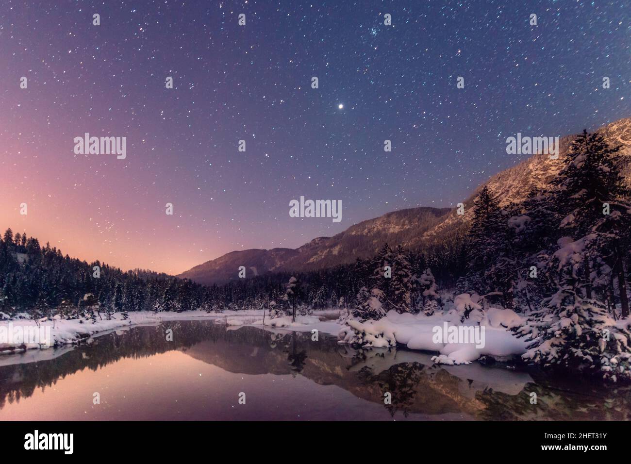 colorful winter night with stars at cold river in tirol Stock Photo - Alamy