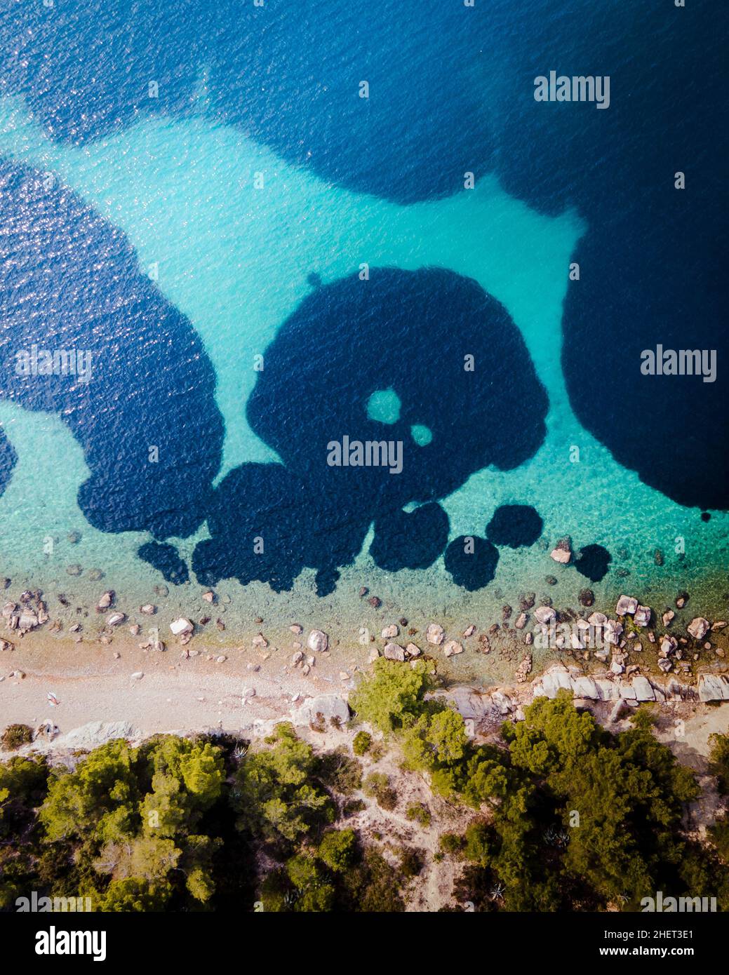 Colorful reef that looks like a smiley, cartoon, Split, Croatia. Aerial ...