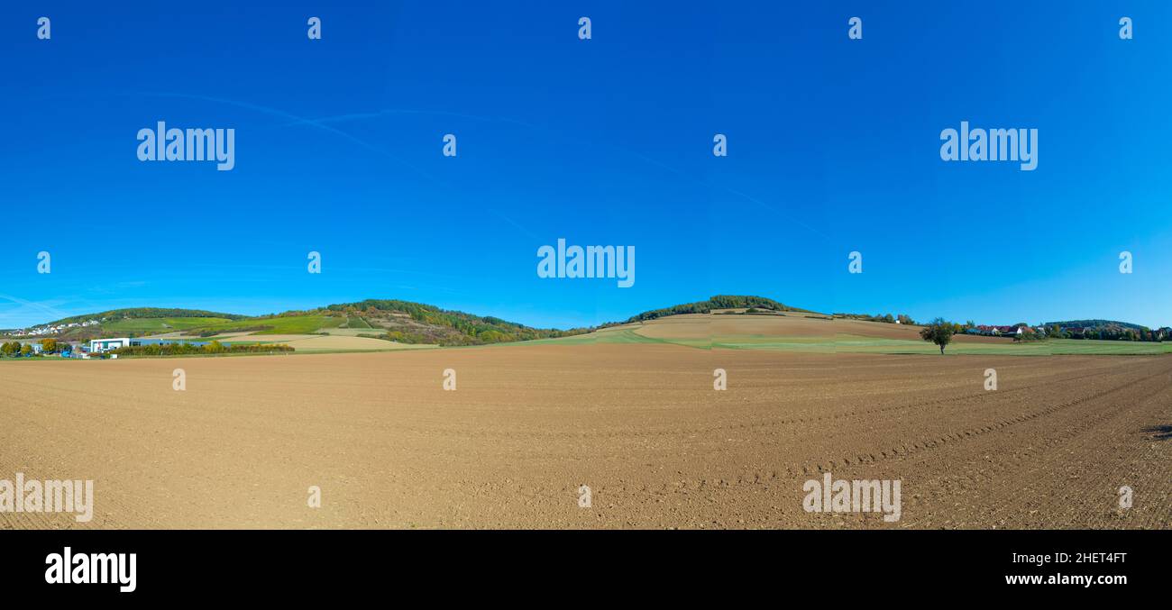 rural landscape with new plowed fields at the romantic street near ...