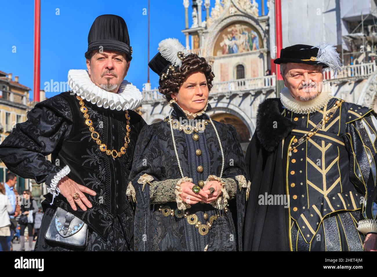 Group in medieval fancy dress costumes pose at the Venice Carnival ...