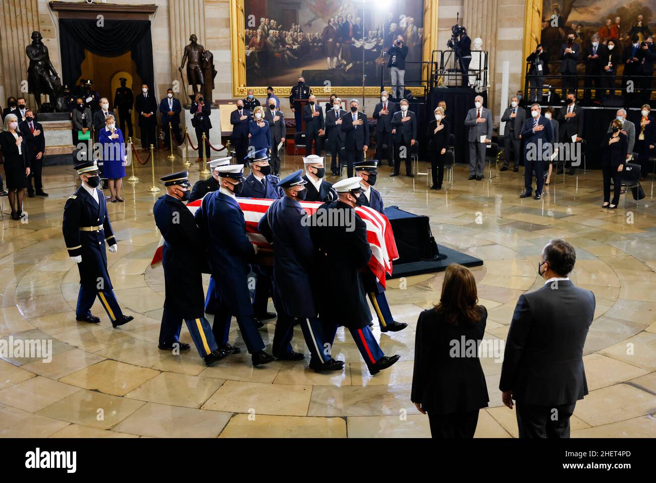 Members of the military honour guard carry the casket of former U.S ...
