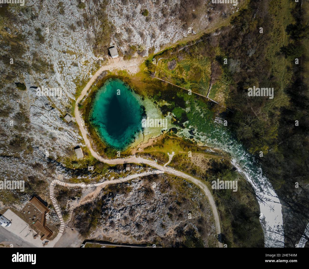 The spring of the Cetina River (izvor Cetine) in the foothills of the ...