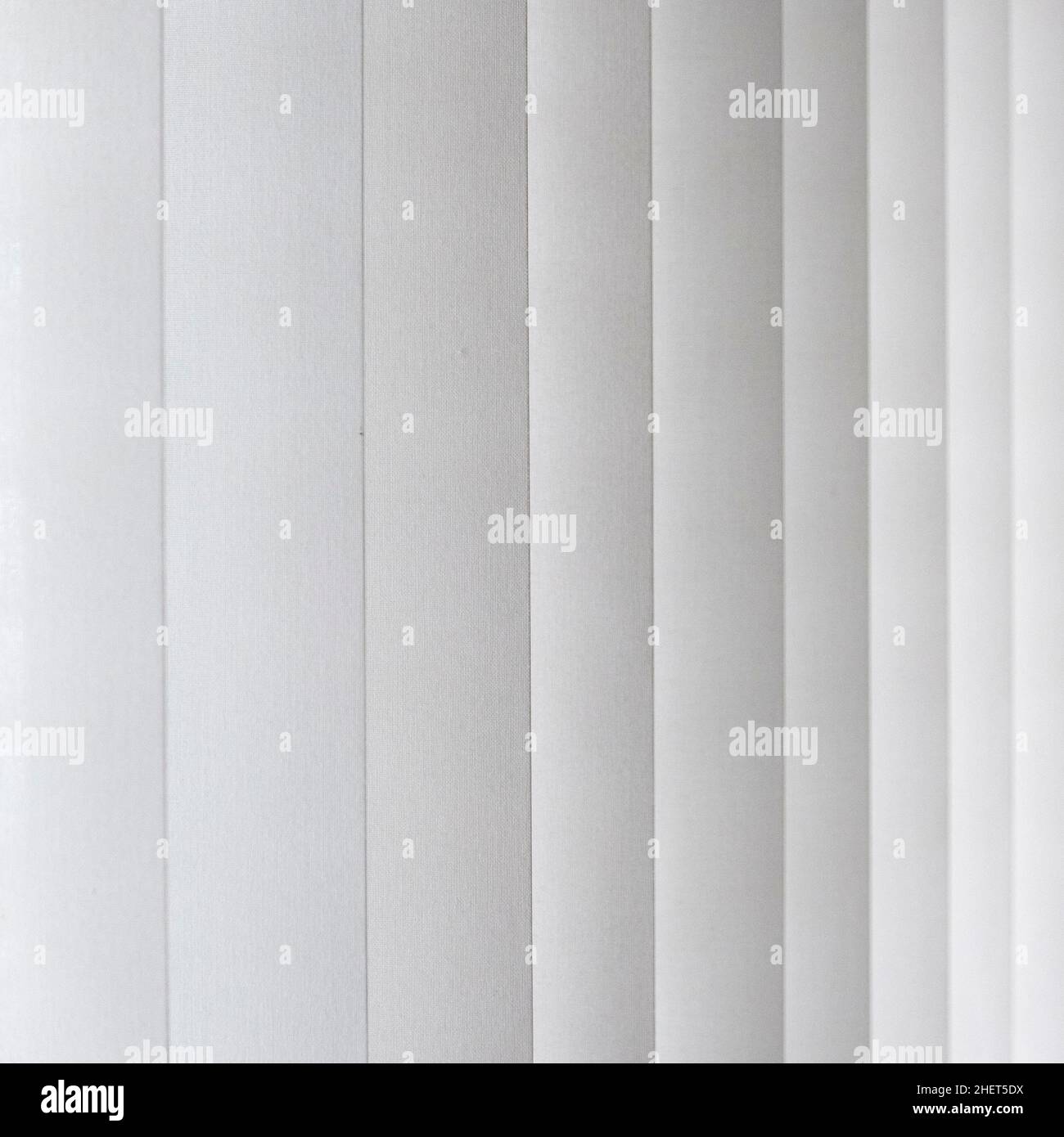 closed shutter of a curtain in grey color gives a harmonic background ...