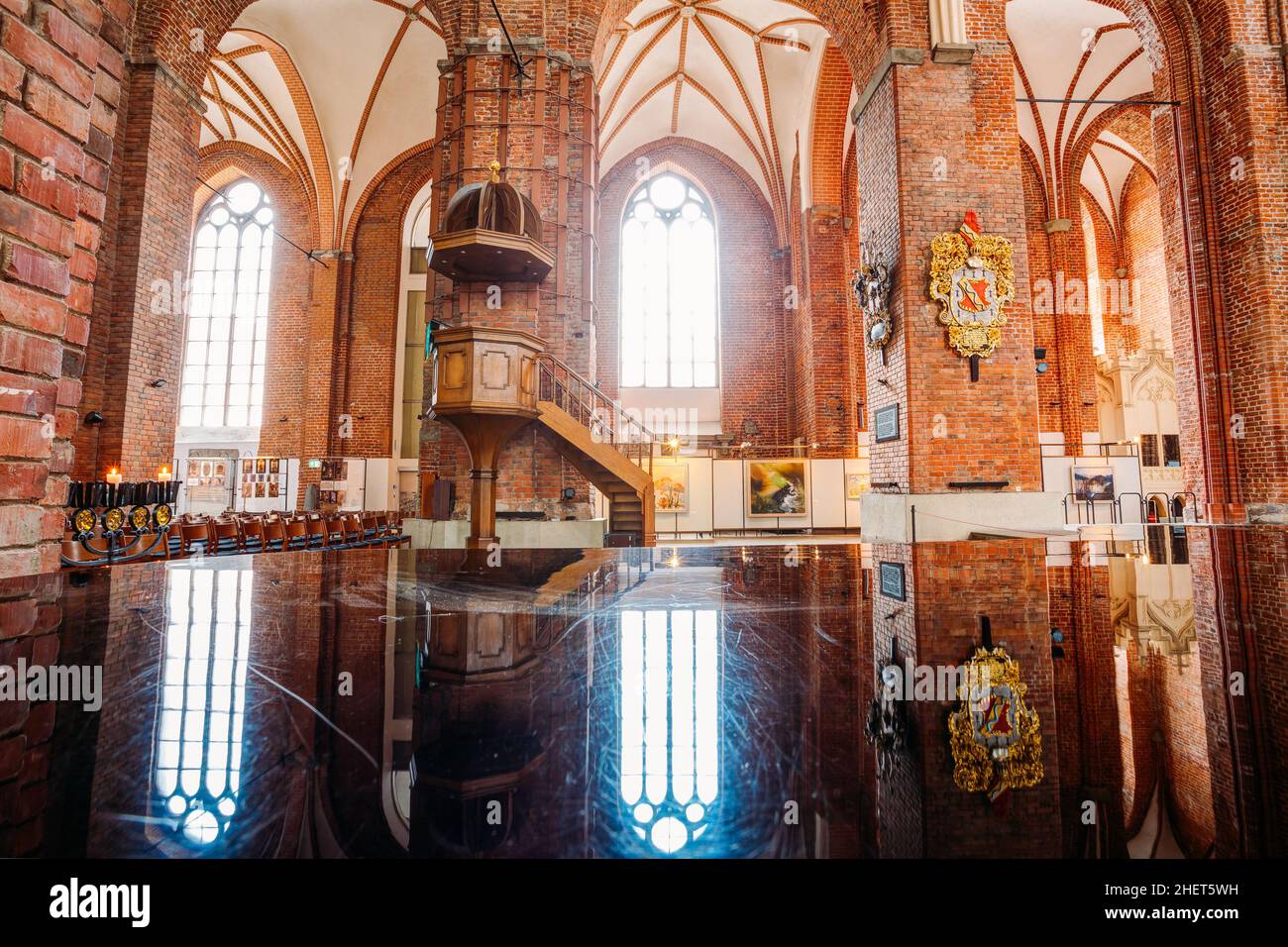 Riga Latvia. Wooden Pulpit In Interior Of St. Peter Church, Reflected ...