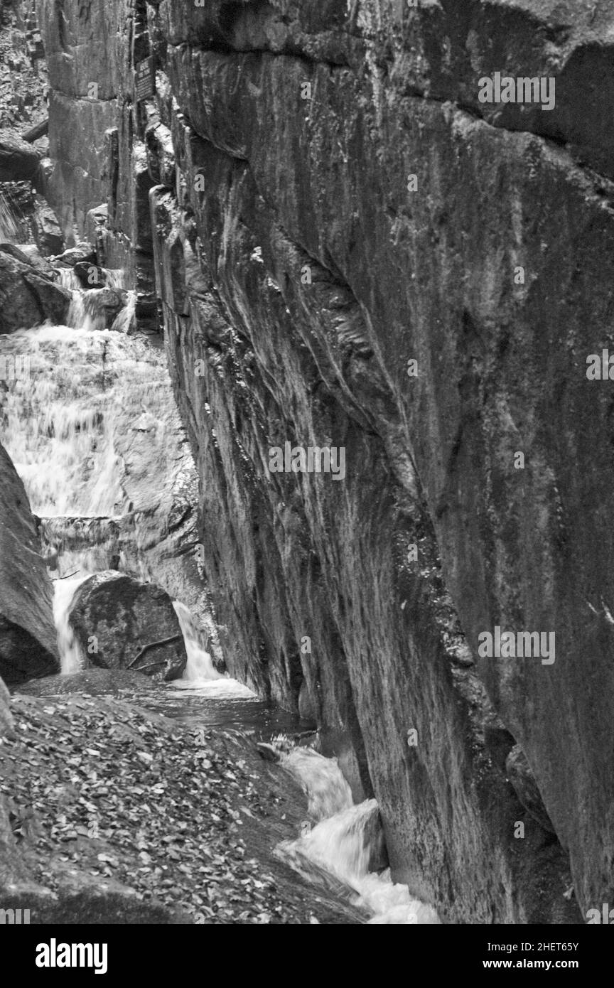 Waterfall in a crevice Stock Photo - Alamy