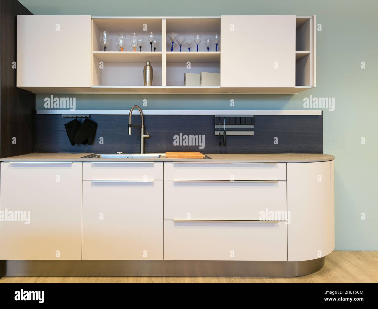 nice small beige kitchen kitchenet with sink and wall unit Stock Photo ...