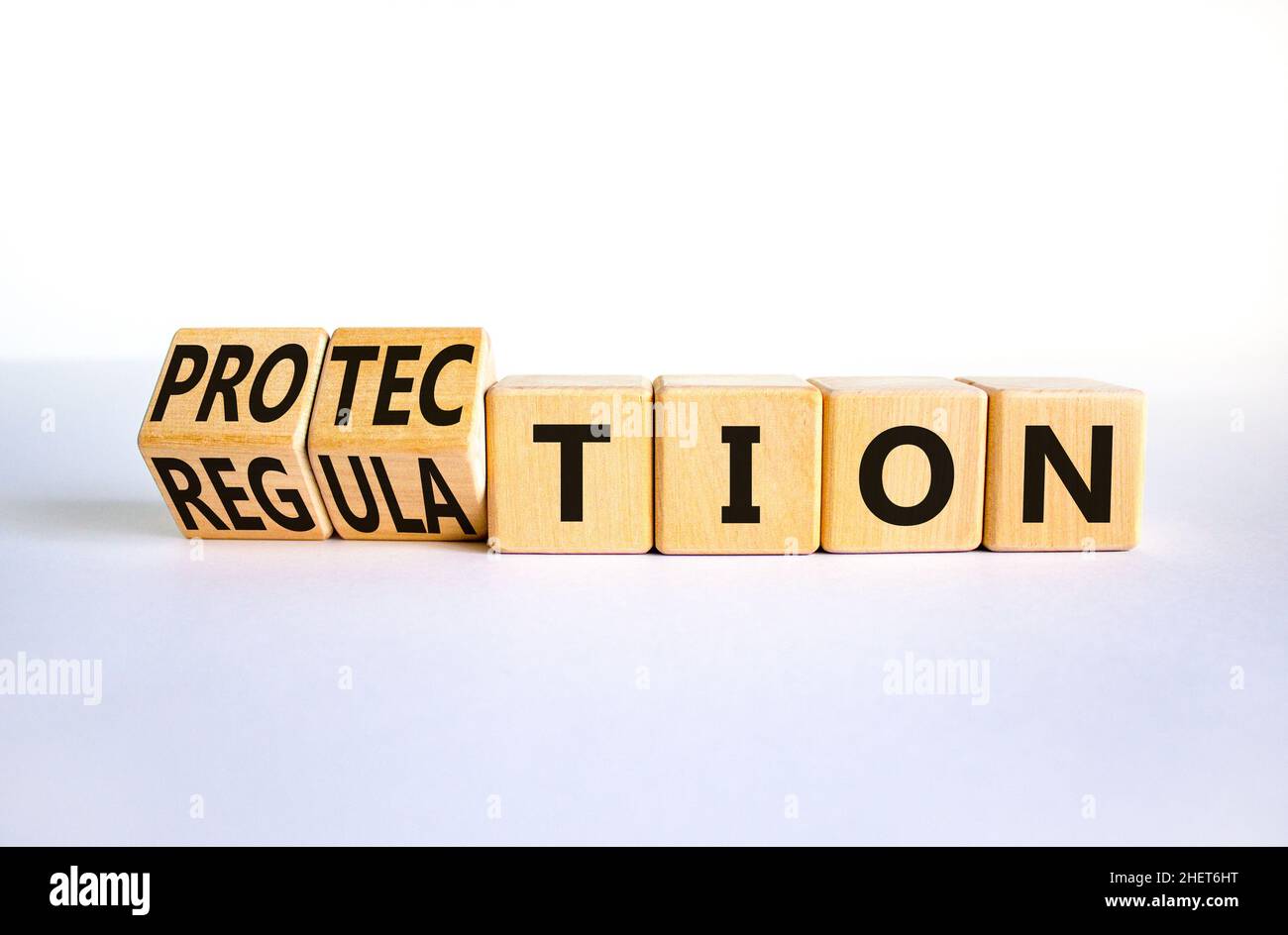 Protection and regulation symbol. Turned wooden cubes and changed the ...