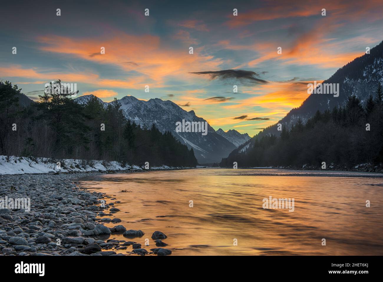 wild alpine river lech at sunset between alpine mountains Stock Photo ...