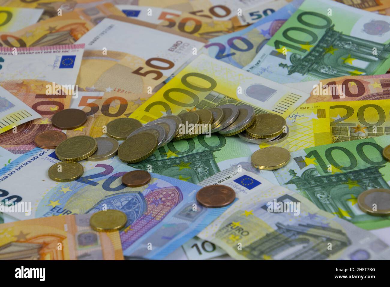 Euro coins lying on euro bill banknotes for financial background Stock ...