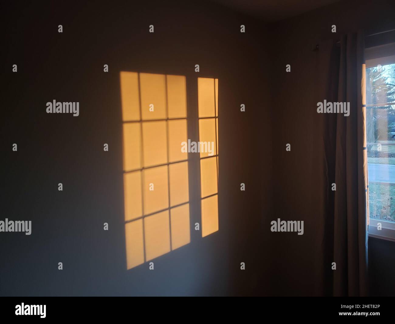 A shadow of a window on a indoor wall Stock Photo - Alamy
