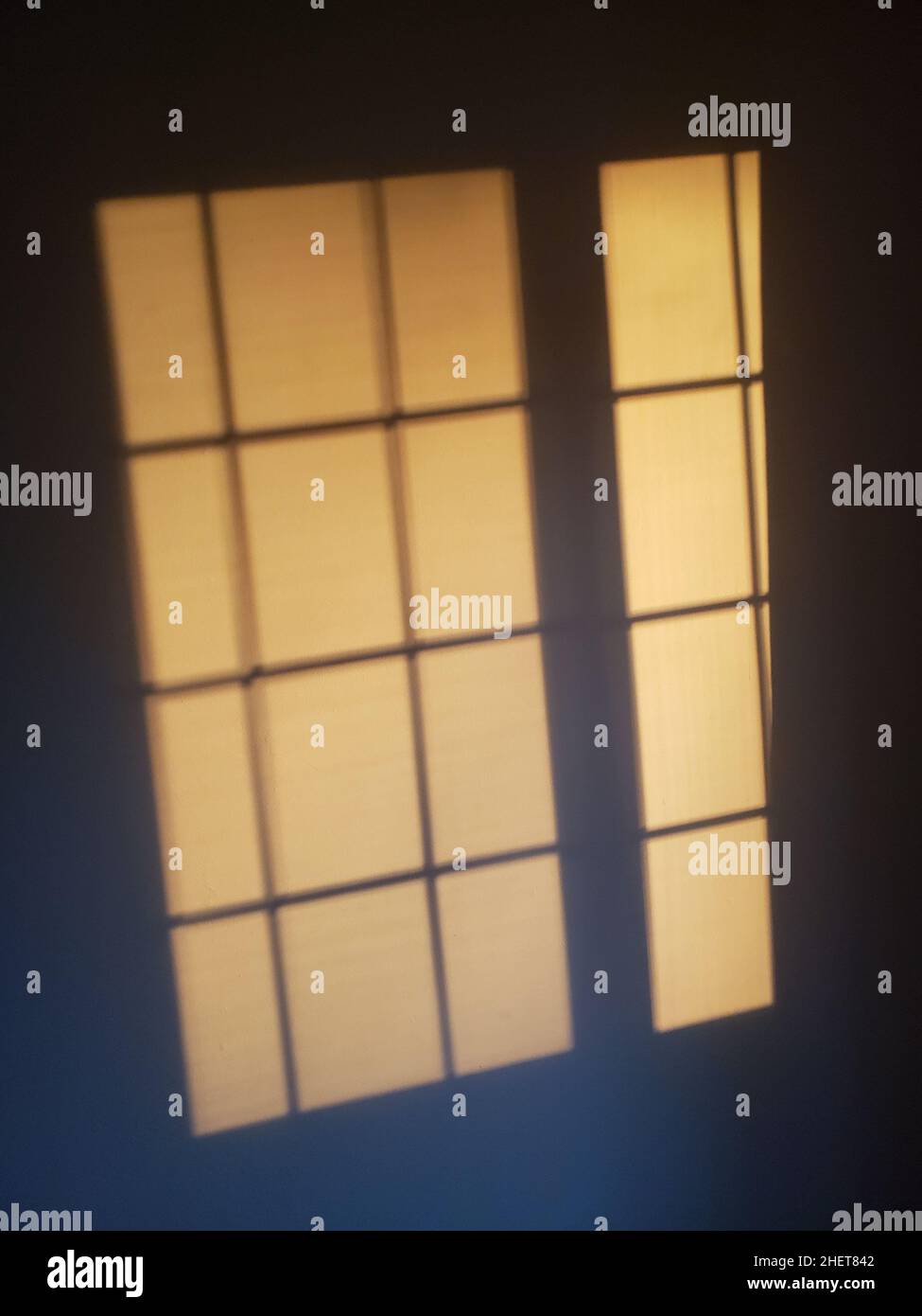 A shadow of a window on a indoor wall Stock Photo - Alamy