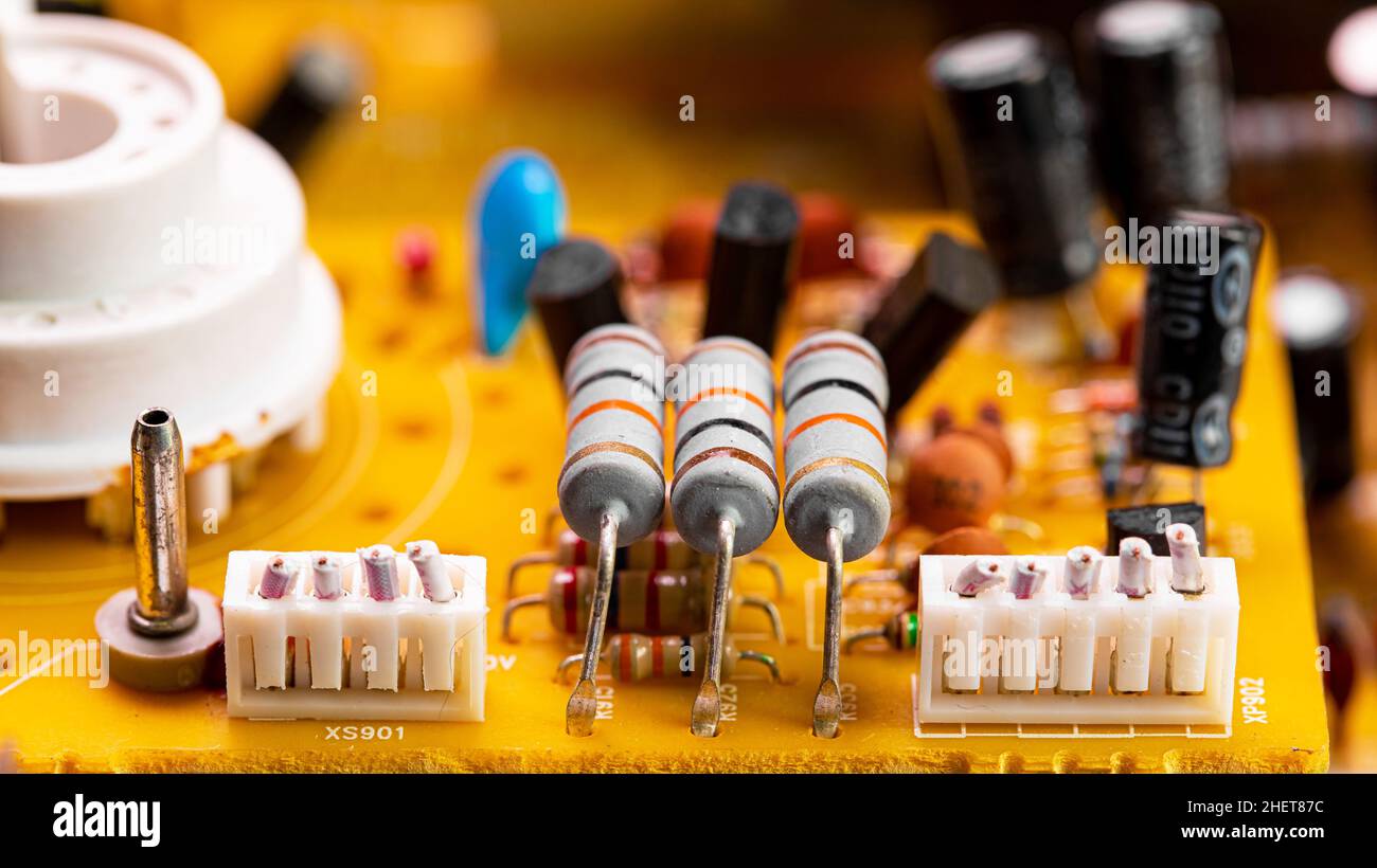 Macro Close up of components and microchips on old PC circuit board ...